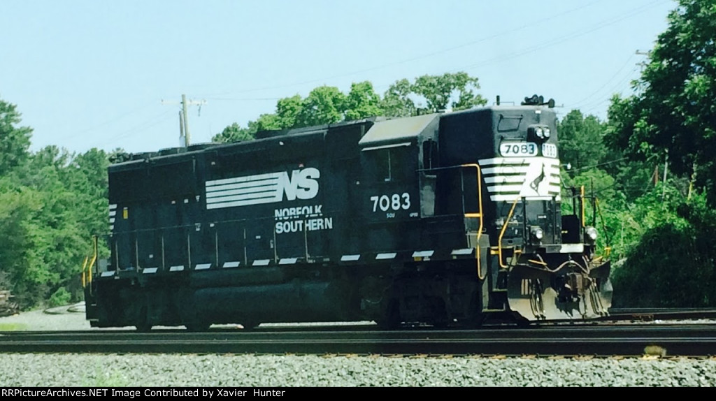 NS 7083 Sitting At The Freight Yard